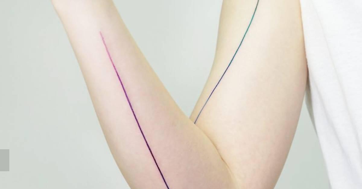 Spectrum lines tattoo located on the arm.