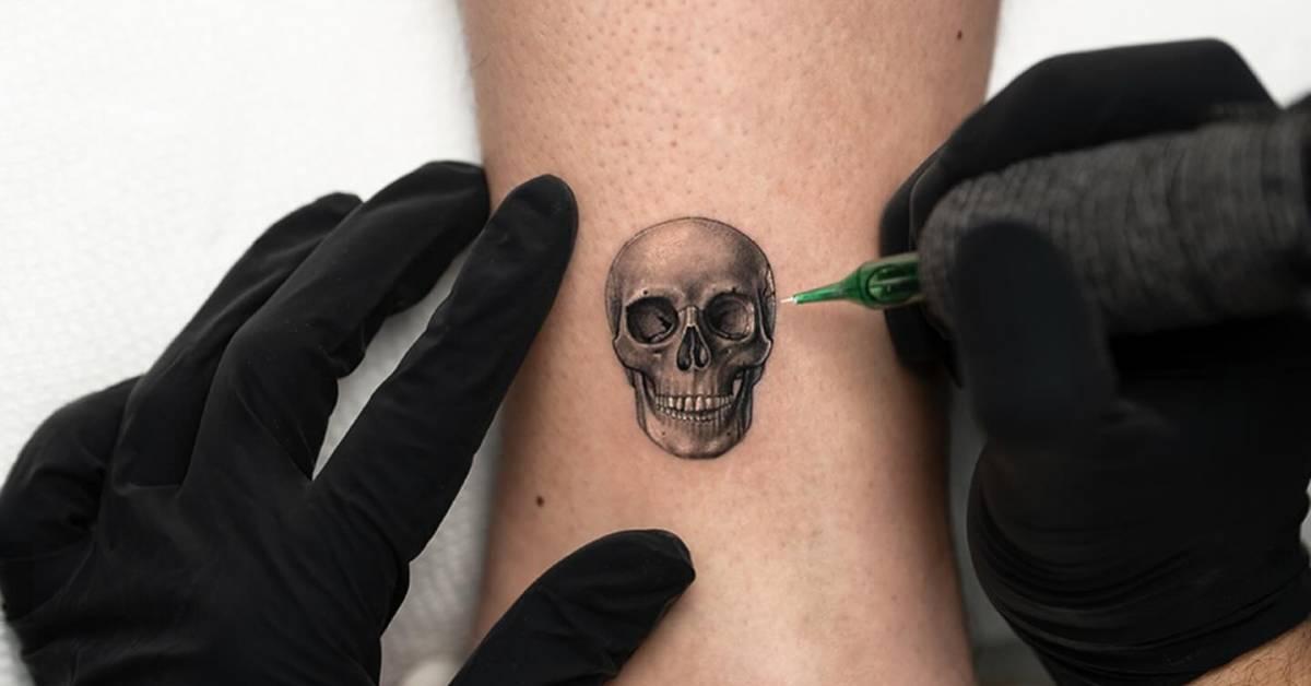 Micro-realistic style skull tattoo located on the