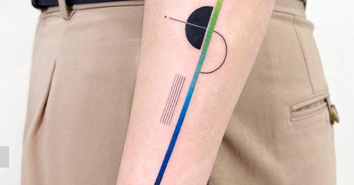 Abstract style geometric tattoo placed on the forearm.