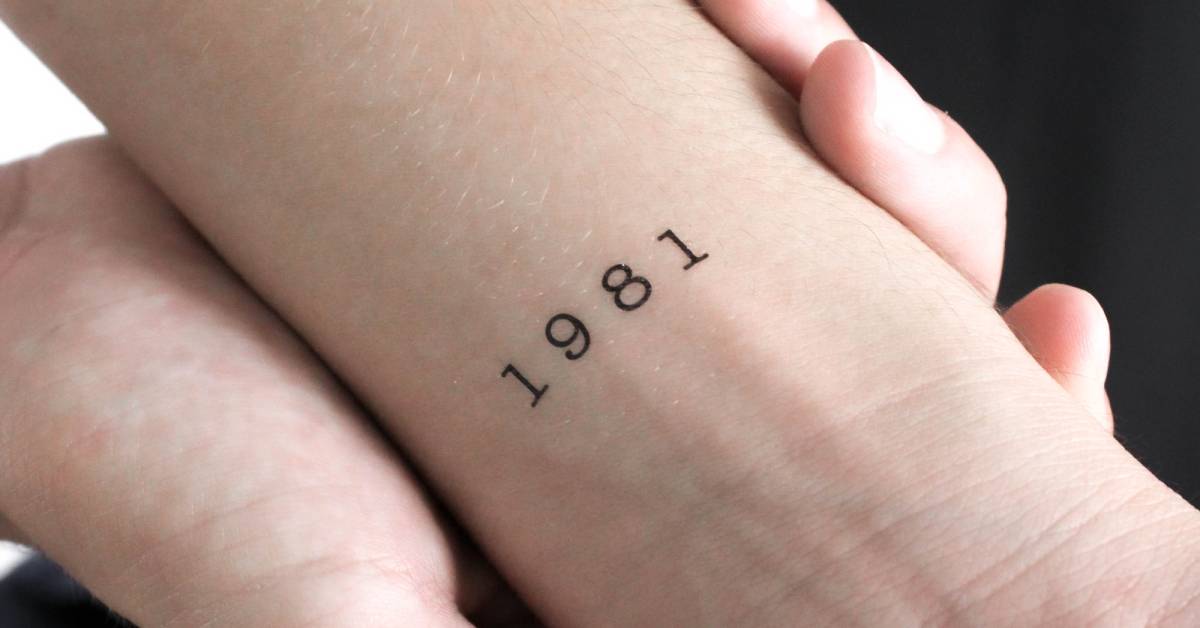 "1981" birth year temporary tattoo located on the