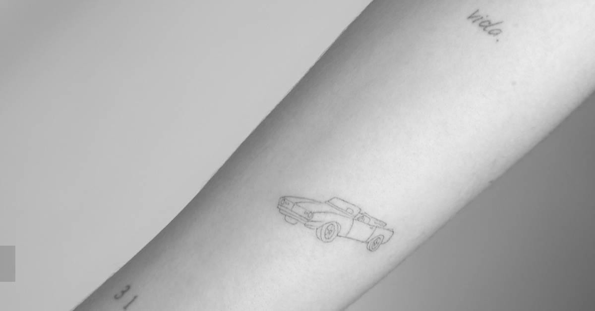 Fine line style car tattoo located on the inner