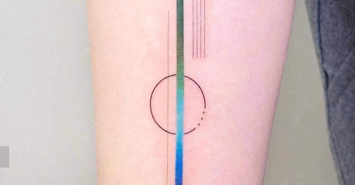 Abstract geometric tattoo located on the inner forearm.