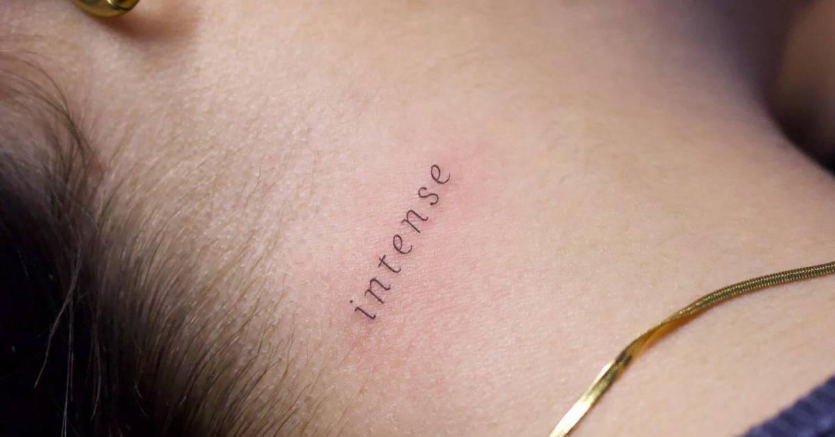 Lettering tattoo of the word "intense" located on the