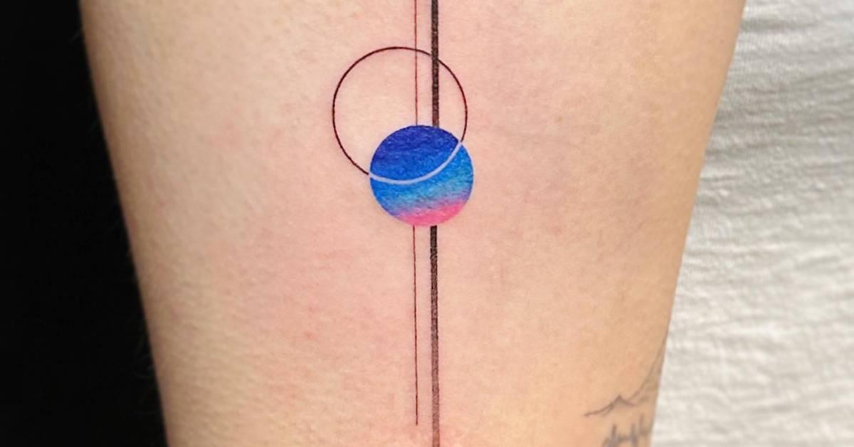 Abstract geometric tattoo placed on the upper arm.