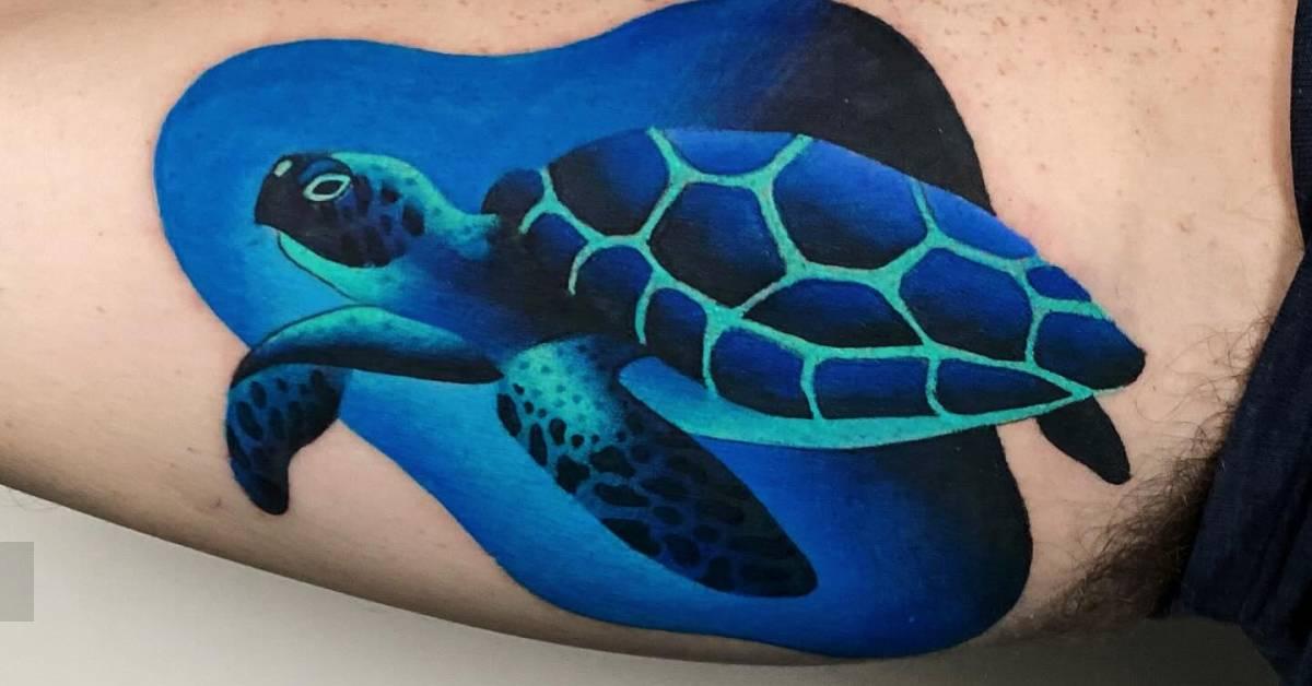 Turtle tattoo located on the inner arm, pop art style.