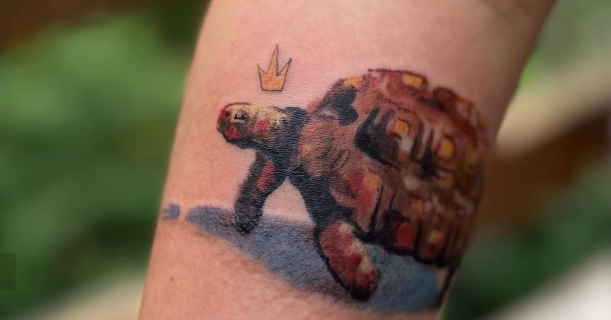 Tortoise tattoo in watercolor style placed on the inner