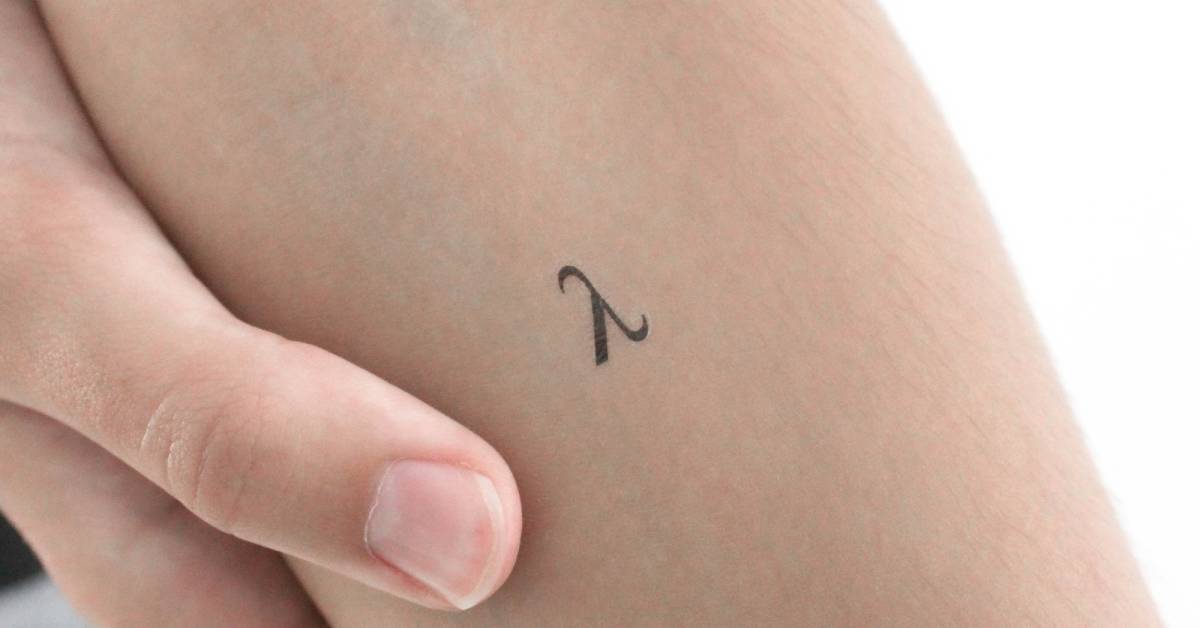 Tiny Lambda temporary tattoo placed on the inner