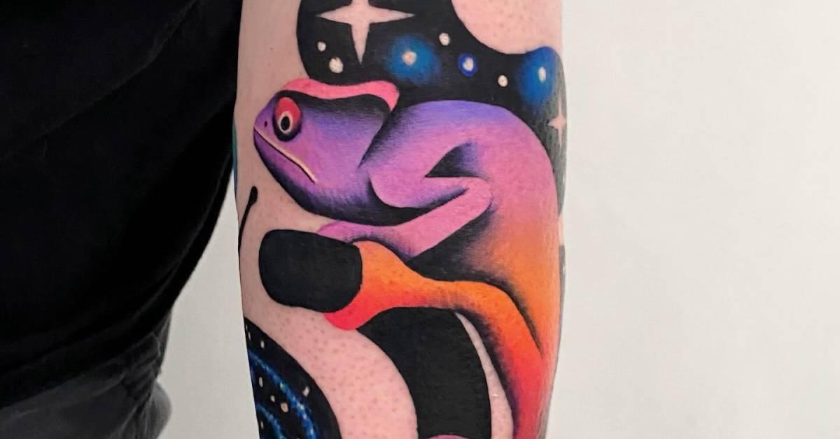 Pop art style chameleon tattoo located on the forearm.