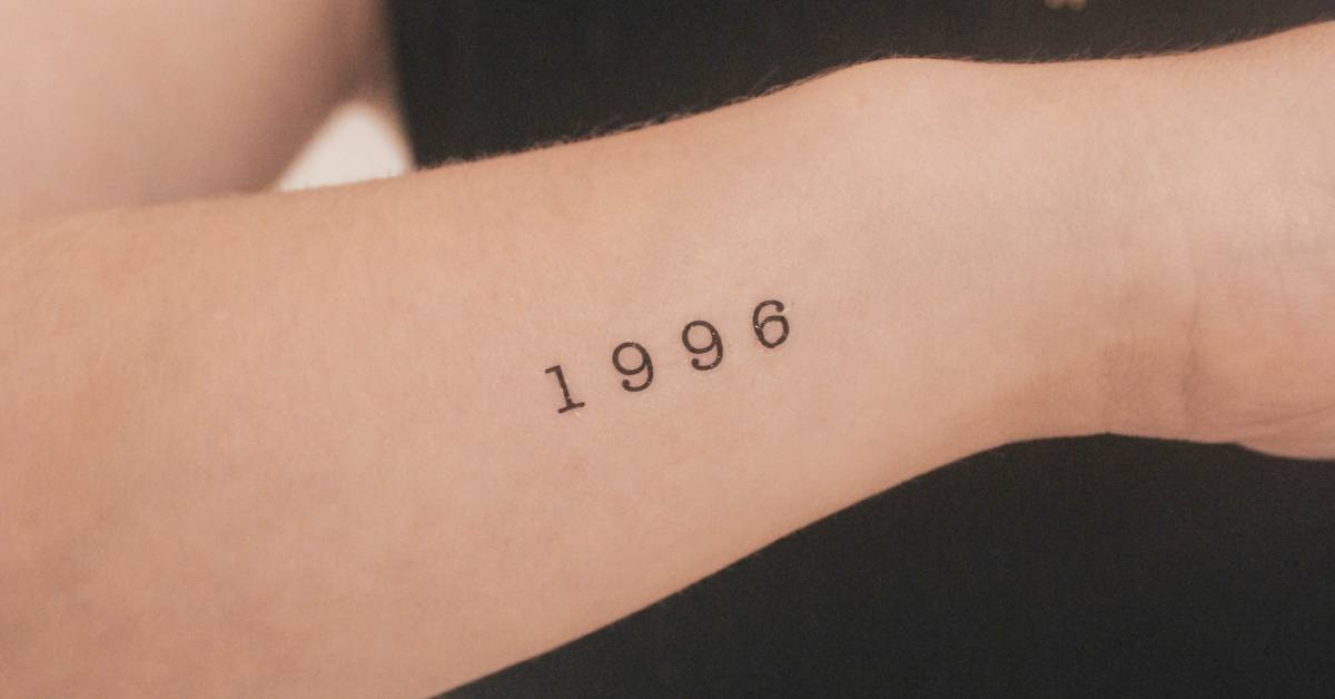 Birth year "1996" temporary tattoo located on the