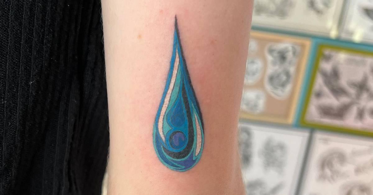 Water drop tattoo in illustrative style located on the