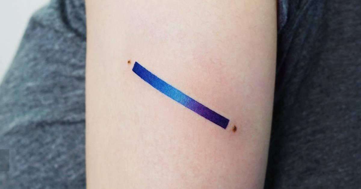 Spectrum tattoo located on the upper arm, watercolor