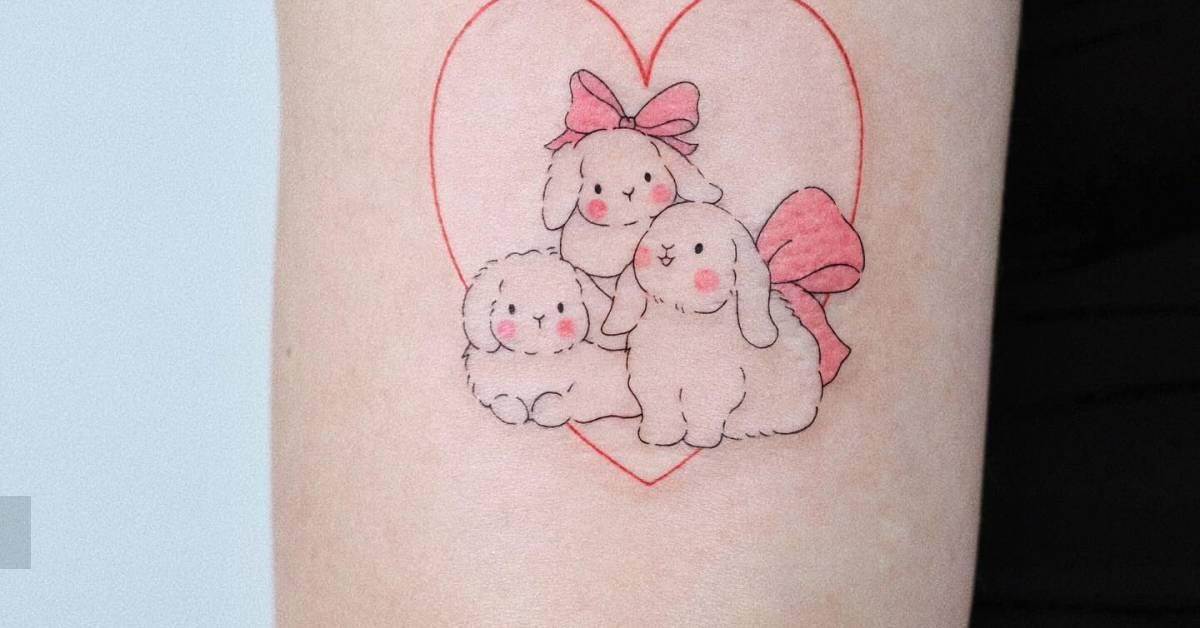 Cute rabbits tattooed on the tricep, illustrative