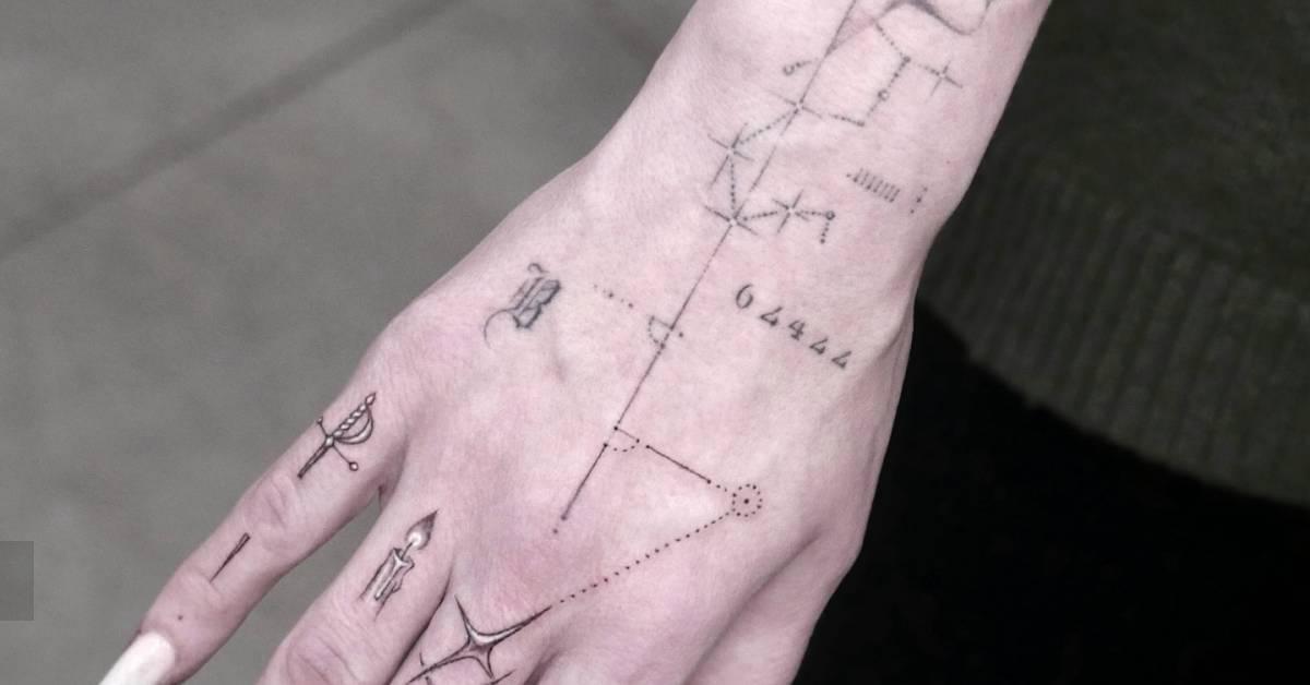 Single needle finger composition tattoos.