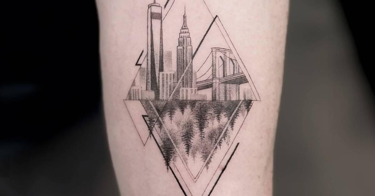 New York City skyline and forest tattoo located on the