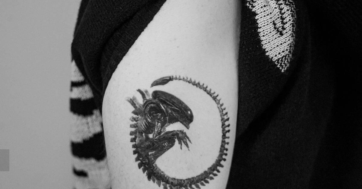Xenomorph micro-realistic tattoo located on the upper