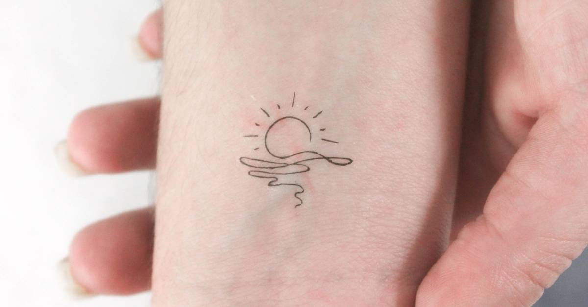 Continuous line sea sunset temporary tattoo located on