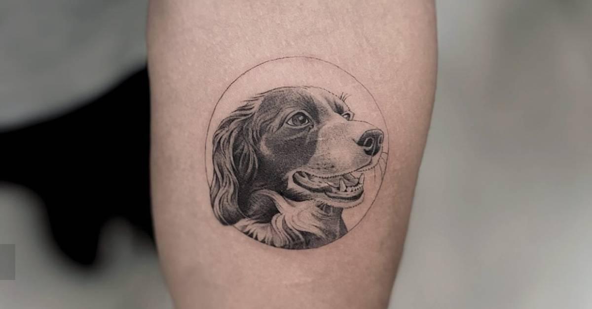 Cocker Spaniel portrait tattoo located on the inner