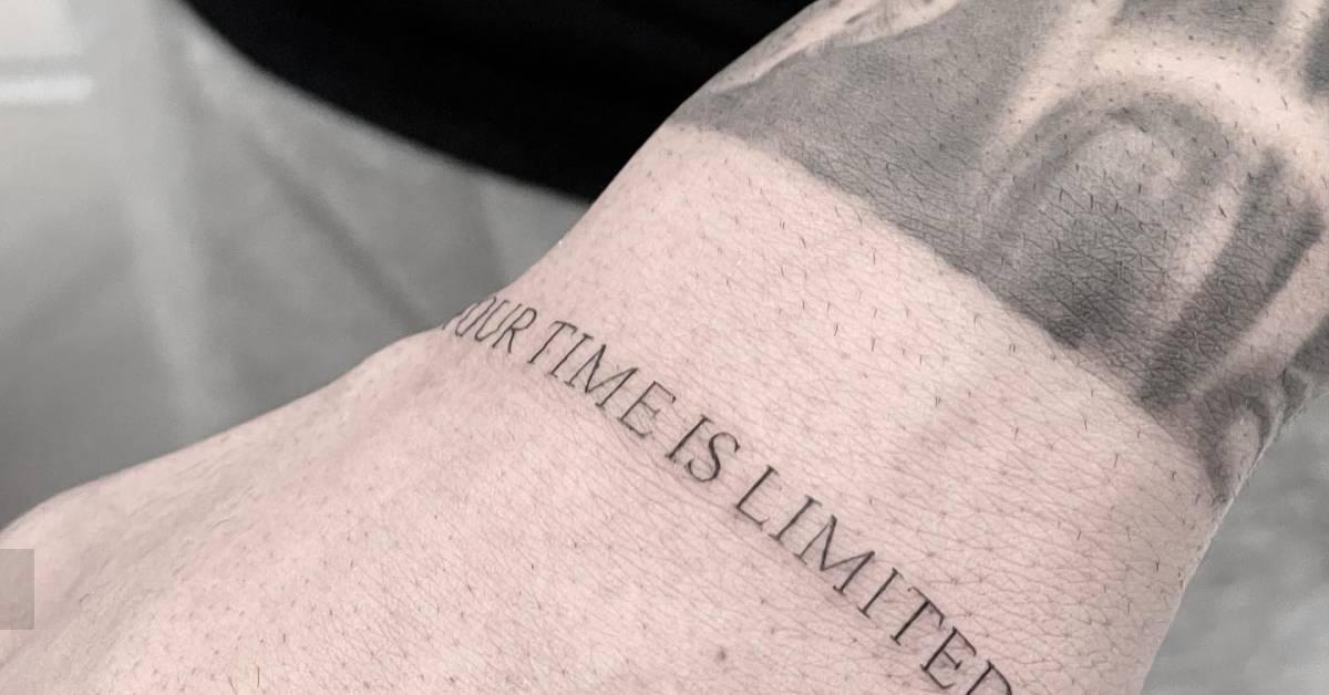 "Your time is limited" in serif font tattooed on the