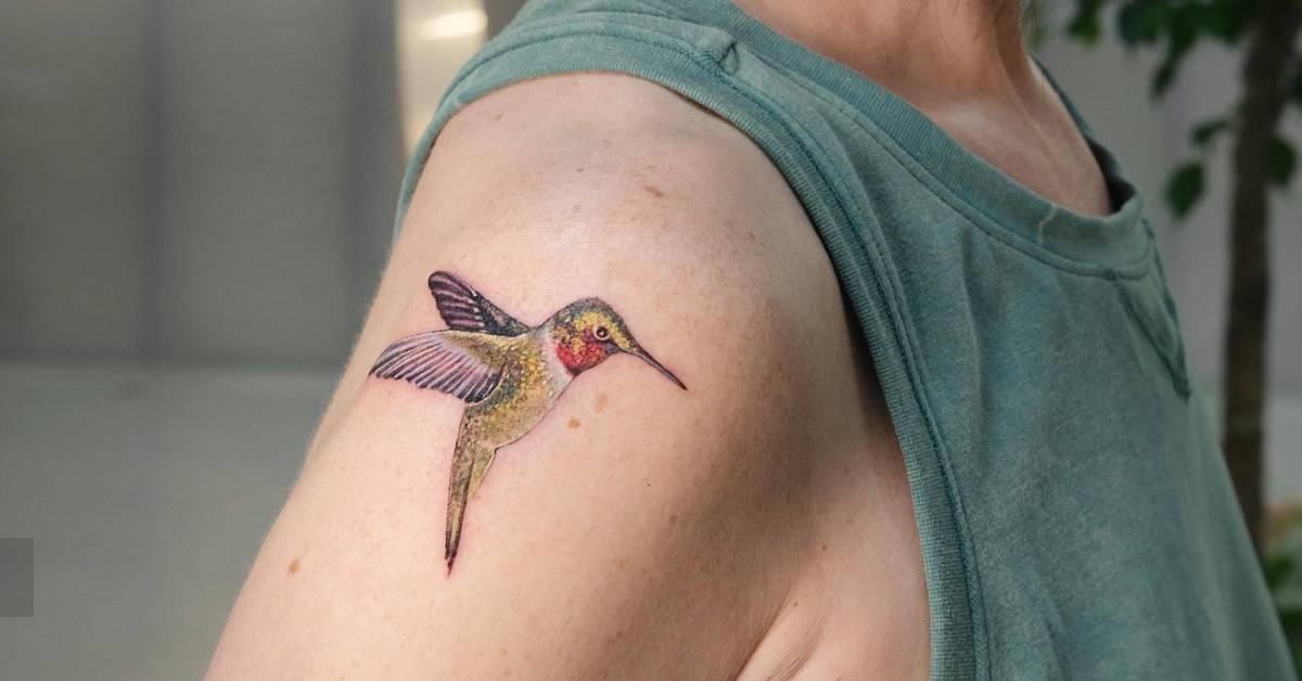 Micro-realistic style hummingbird tattoo done on the