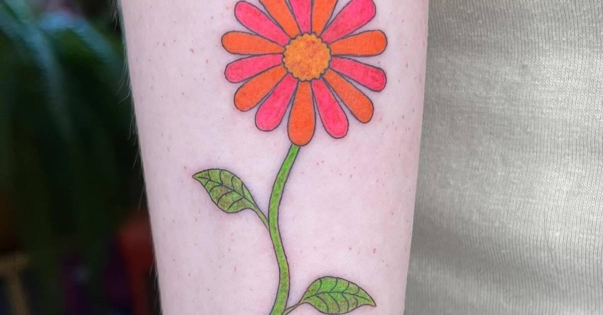 Daisy flower tattoo in illustrative style located on
