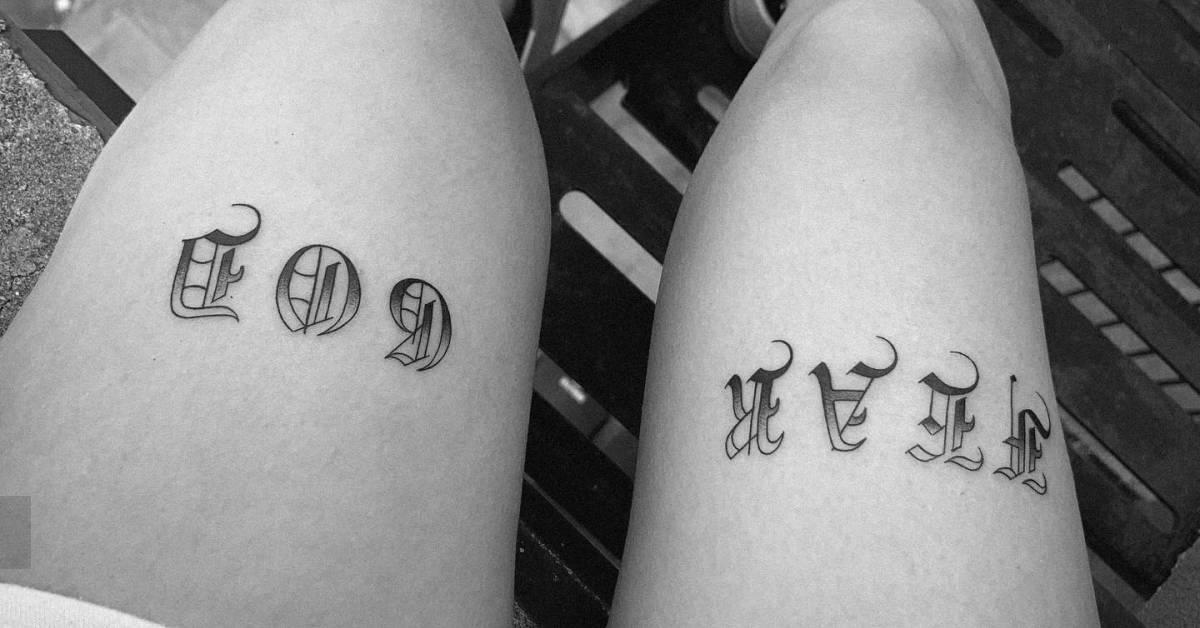 "Fear God" in gothic font tattooed on OneRosen's