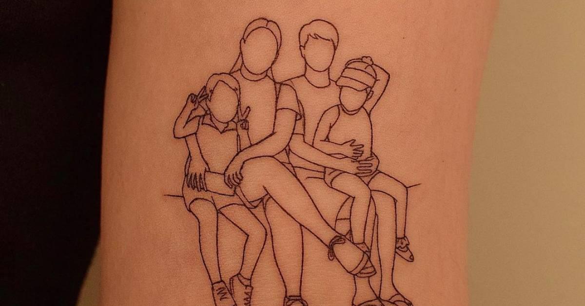 Fine line family photograph tattoo on the bicep.