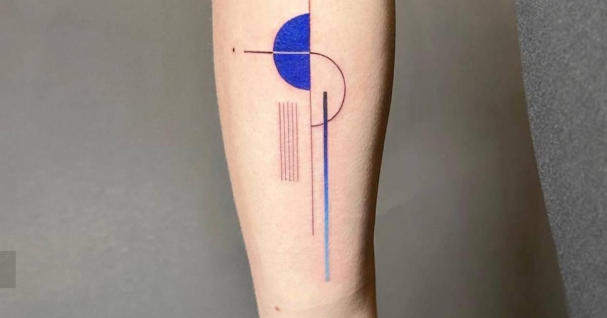 Geometric tattoo located on the inner forearm.