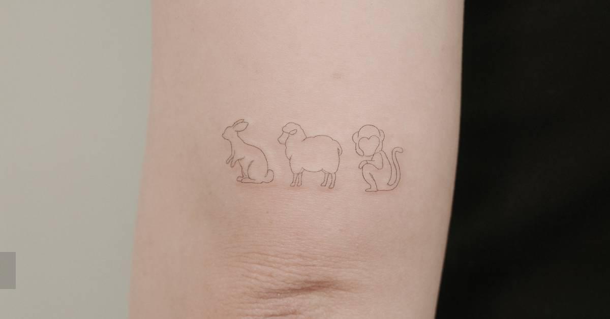 Rabbit, sheep and monkey tattoo in fine line style