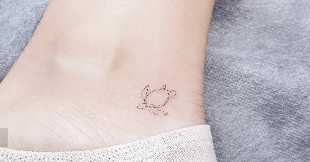 Tiny minimalistic turtle tattoo done on the ankle.