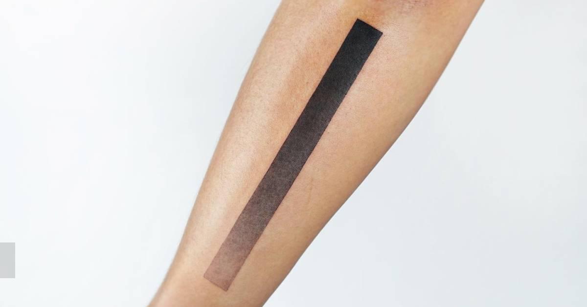 Spectrum tattoo in watercolor style located on the