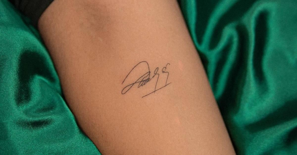 Signature tattoo done on the inner forearm.