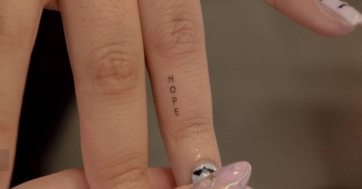 Micro lettering tattoo of the word "hope" done on the