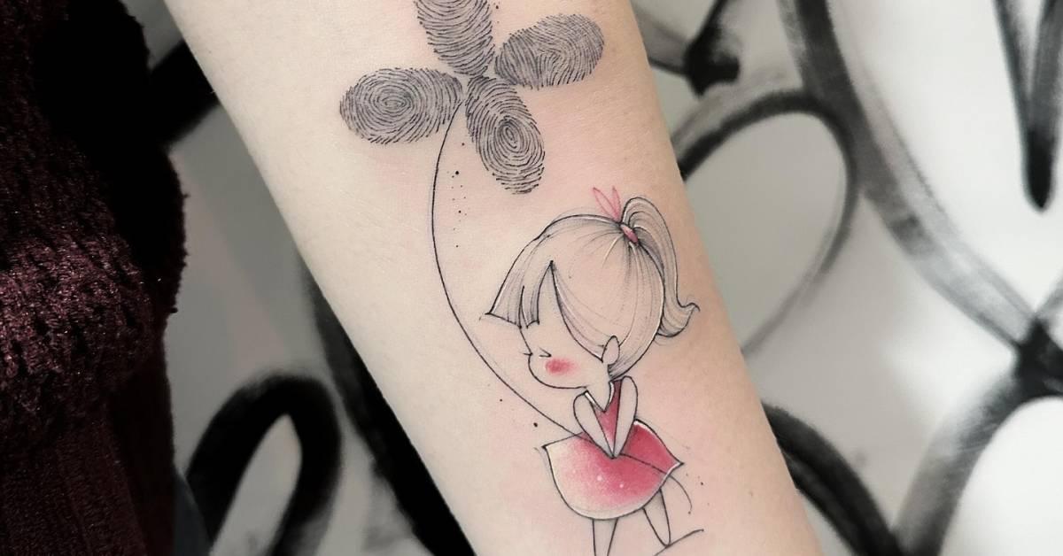 Cartoon style child and fingerprint clover tattoo