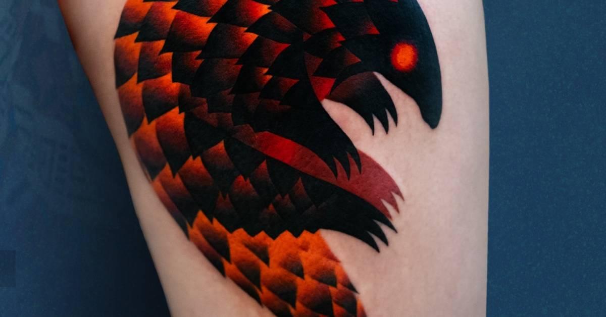 Pop art style pangolin tattoo placed on the thigh.
