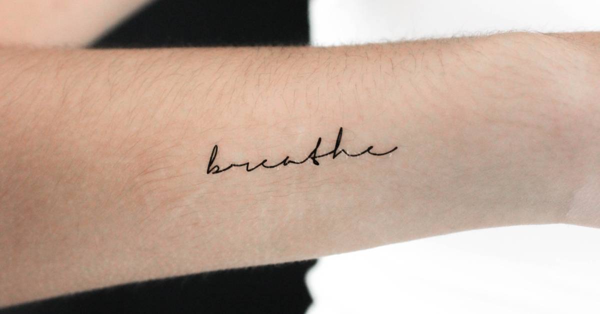 Handwritten font 'breathe' temporary lettering tattoo