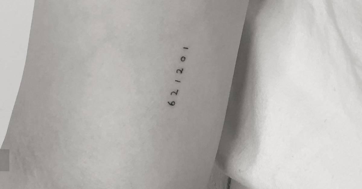 Date tattoo located on the inner arm.