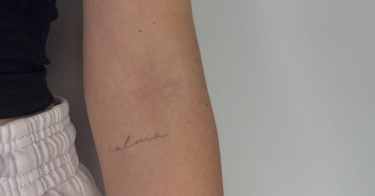 Lemons, "calma " and tulip shell tattoos in fine line