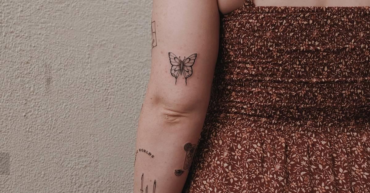 Illustrative style arm composition tattoos.