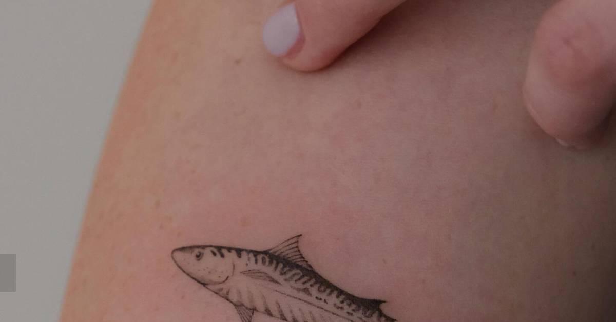 Micro-realistic style mackerel tattoo placed on the