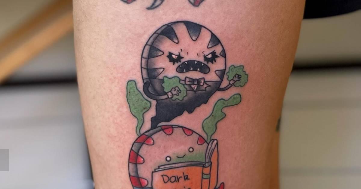 Peppermint Butler tattoo located on the thigh.