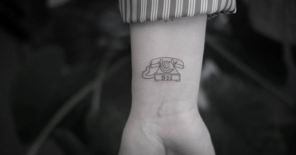 Little telephone tattoo located on Jennifer Love