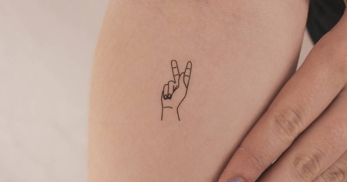 Sign language letter "K" temporary tattoo located on