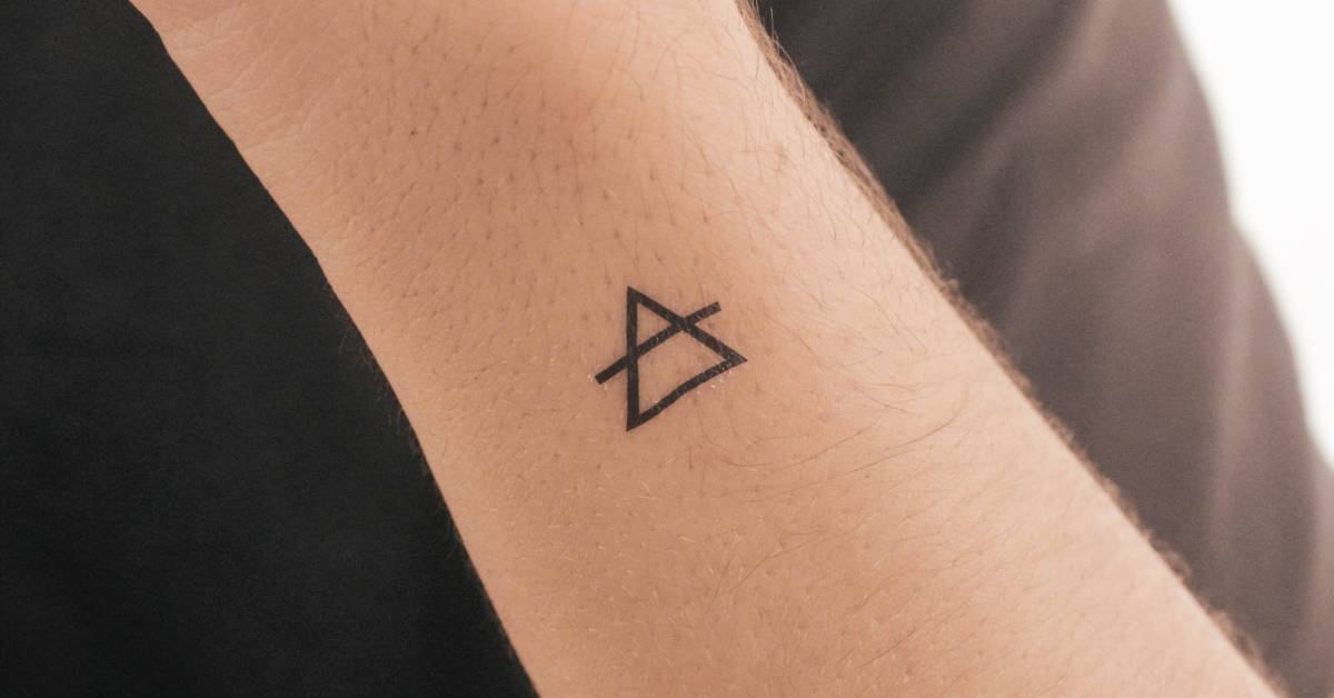Minimalistic style transcend symbol temporary tattoo