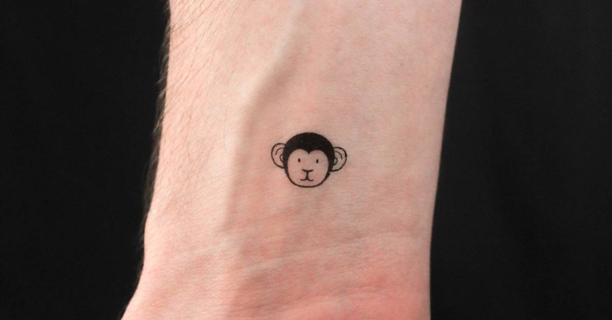Little minimalistic monkey face temporary tattoo