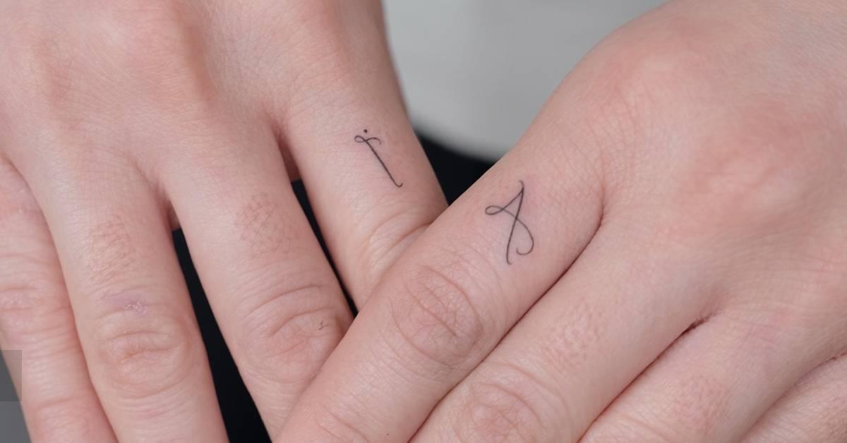 Individual matching initials tattoo located on the