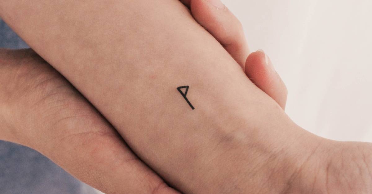 Minimalistic style wynn rune temporary tattoo located