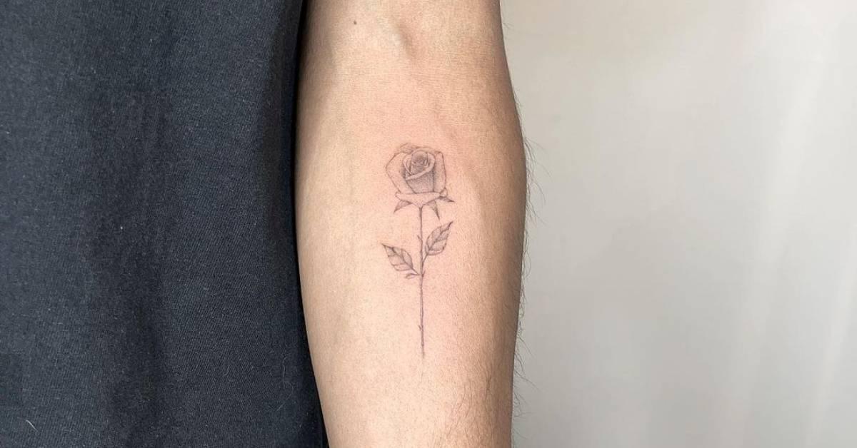 Micro-realistic style rose tattoo done on the inner