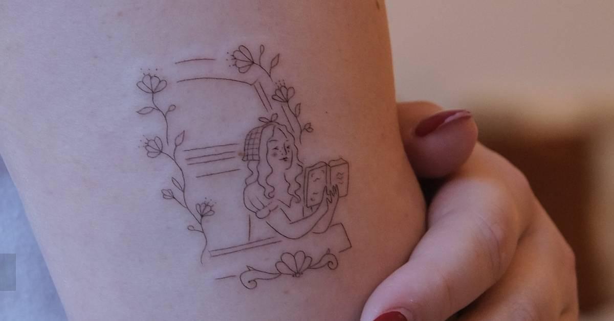 Woman on a window tattooed on the upper arm, fine line