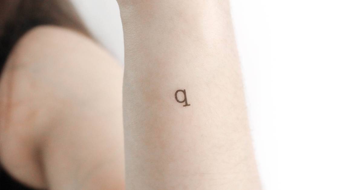 "Q" lowercase typewriter letter temporary tattoo