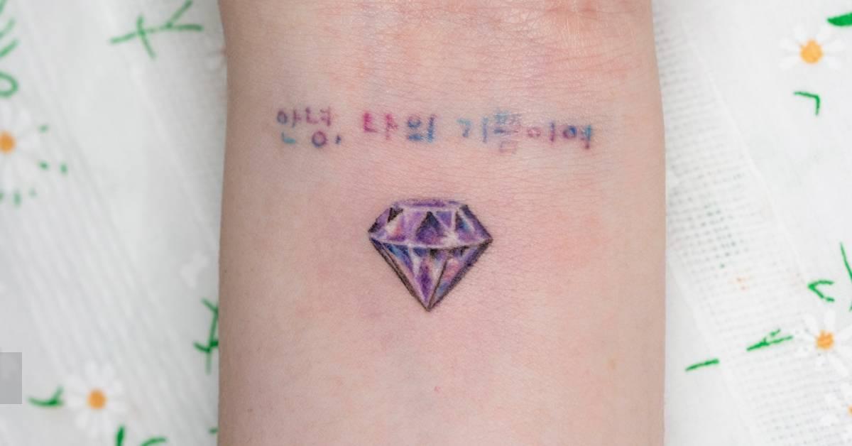 Amethyst gemstone tattoo in micro-realistic style
